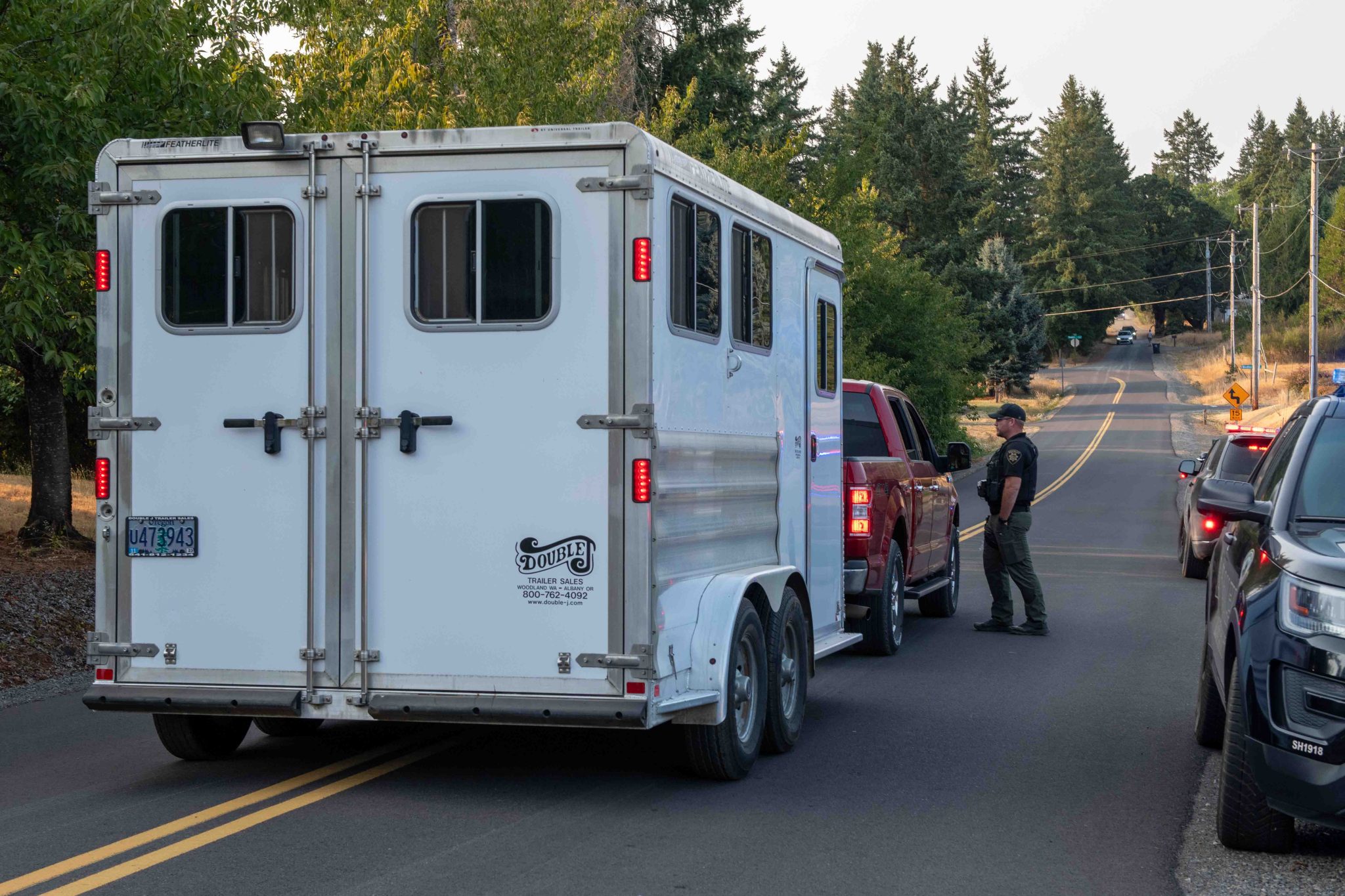 Liberty Fire contained after burning 25 acres, threatening hundreds of ...